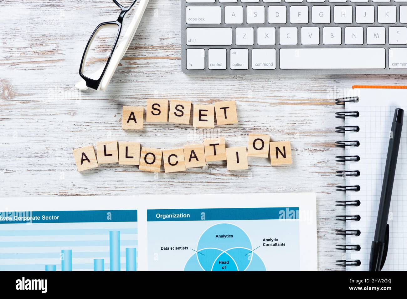 Asset allocation concept with letters on cubes Stock Photo - Alamy