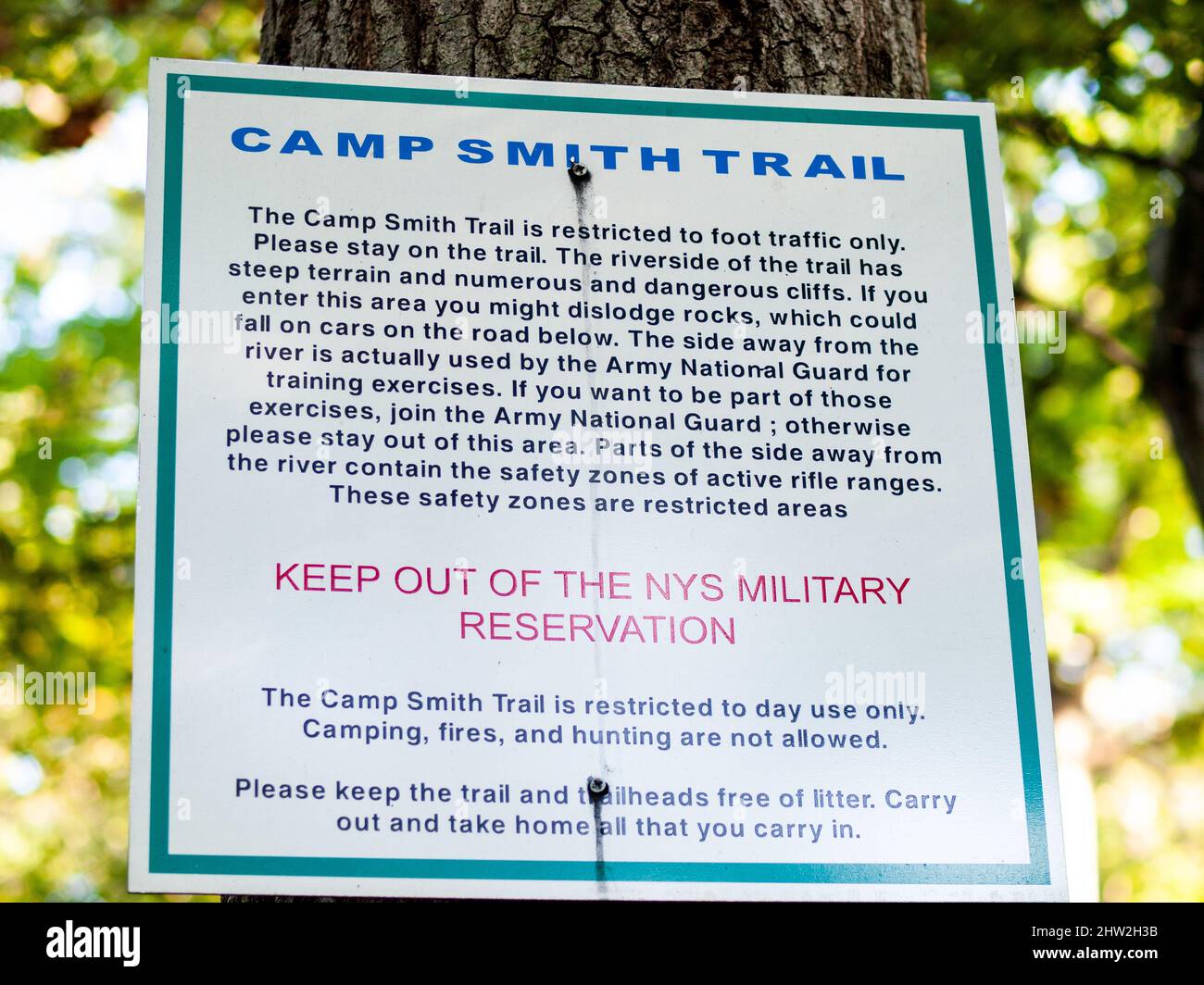 warning sign on trail along military boundary unexploded ordinance keep ...