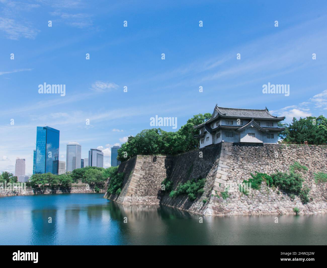 Japanese style house surrounded by water Stock Photo - Alamy