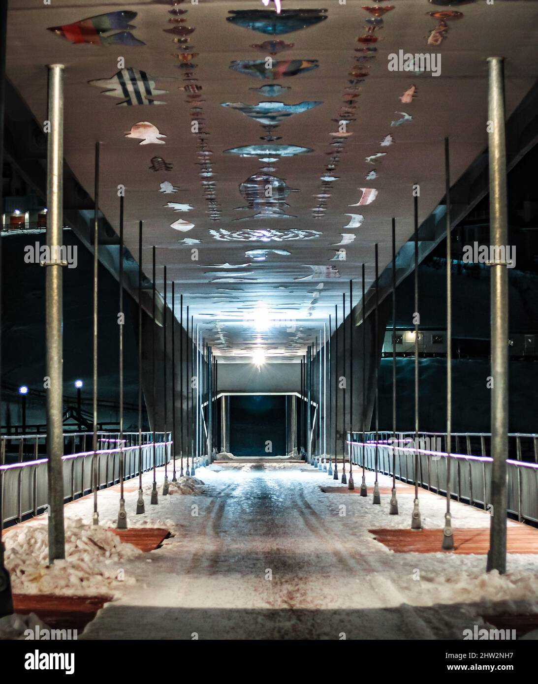 Beautiful view of an empty snowy road on a bridge Stock Photo - Alamy