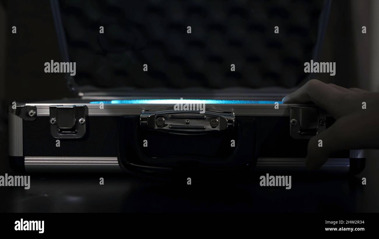 Mysterious black briefcase hi-res stock photography and images - Alamy