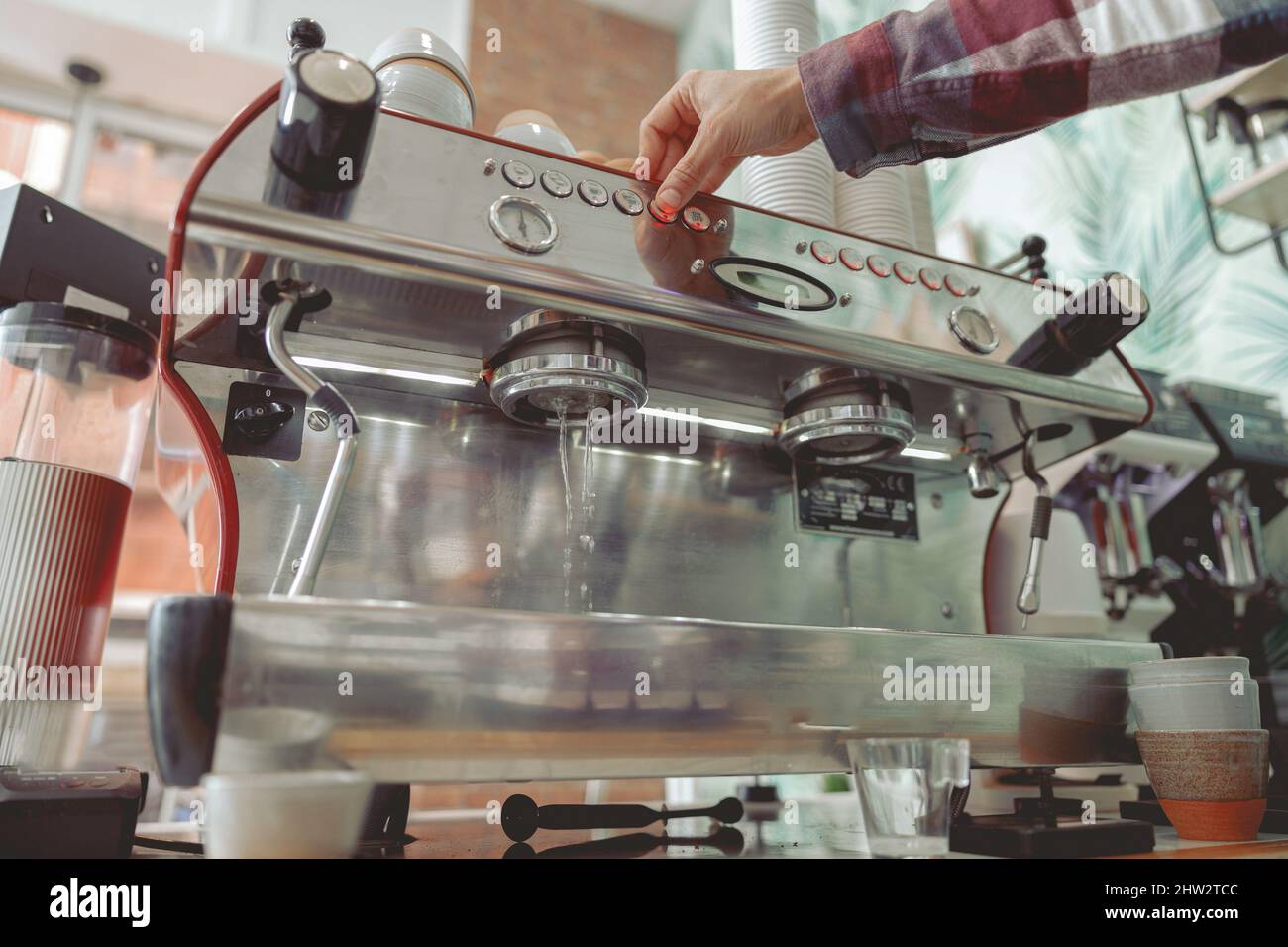 Photo of working coffee machine standing on bar counter Stock Photo - Alamy