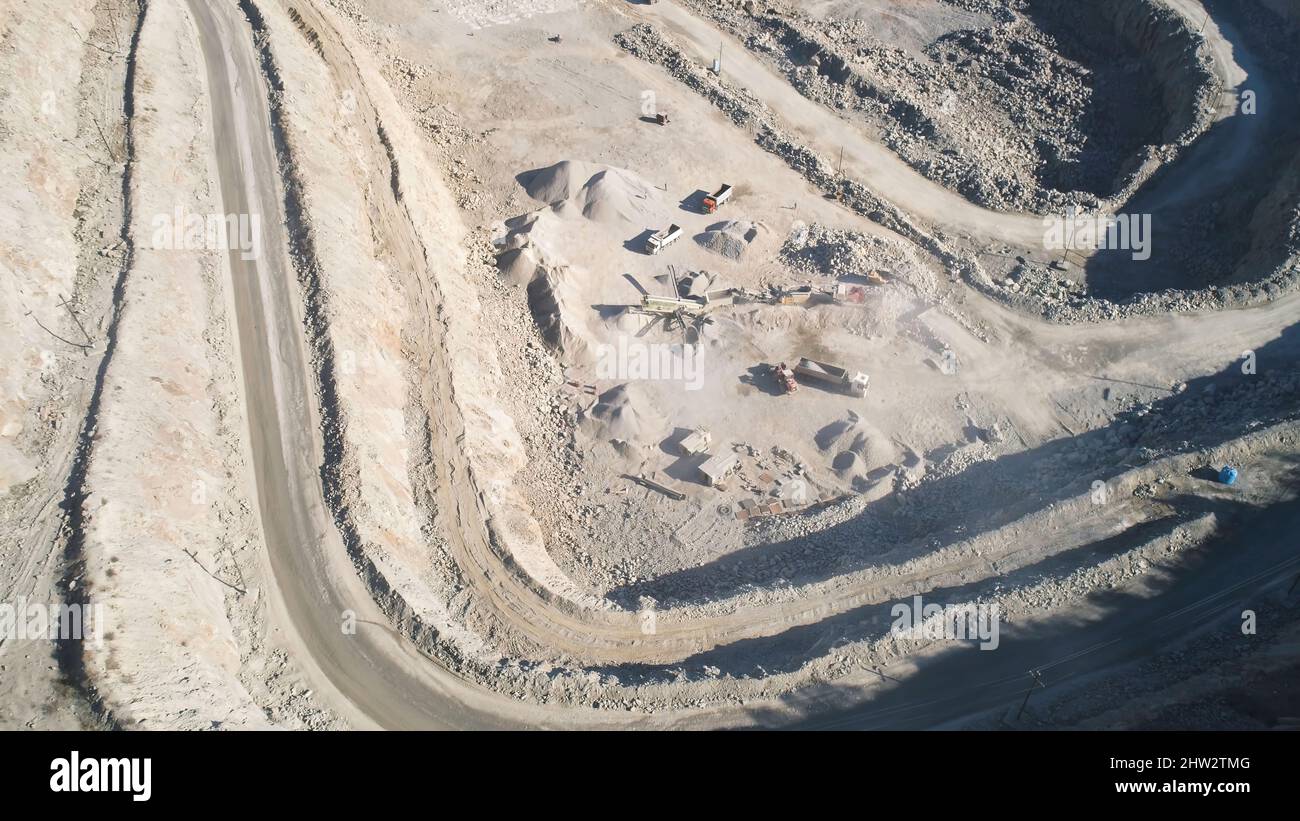 Top view of sand quarry with excavators. Shot. Open pit mining ...