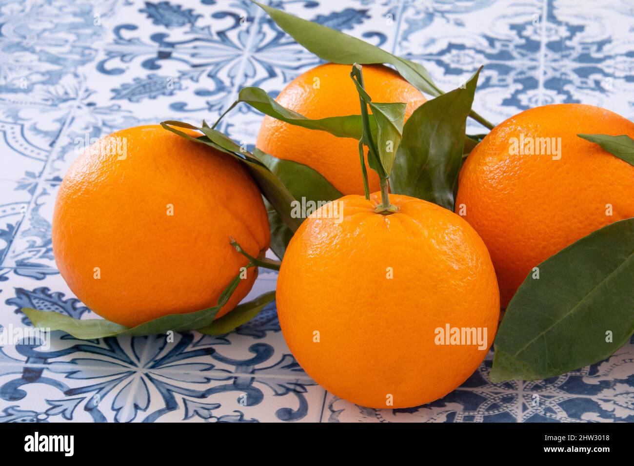 whole leaf orange on a table Stock Photo - Alamy
