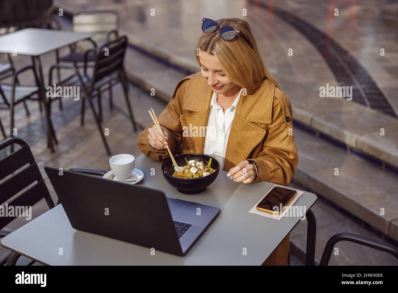 Female sitting table eating lunch hi-res stock photography and images ...