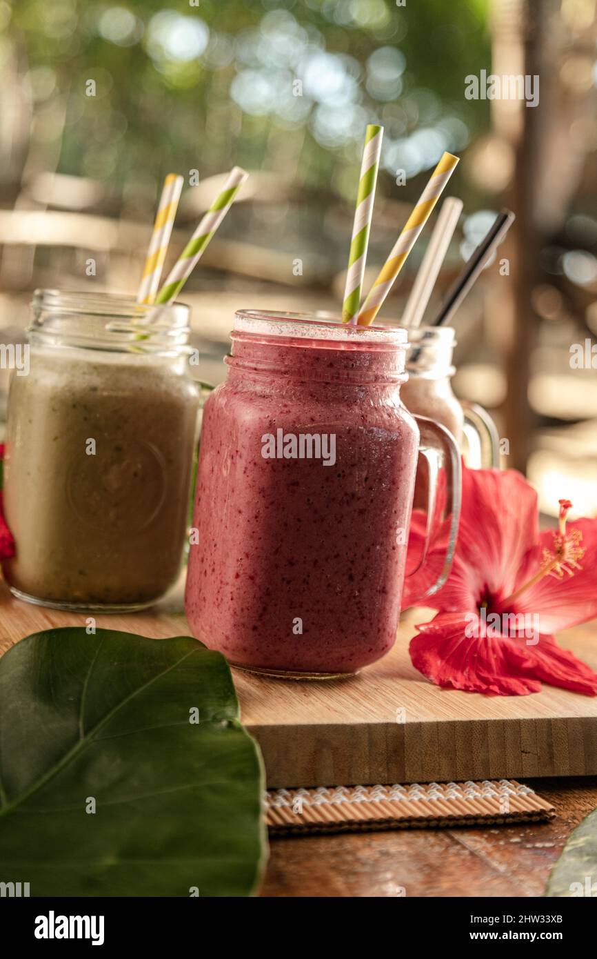 Closeup of different flavored smoothies: kiwi, strawberry Stock Photo ...