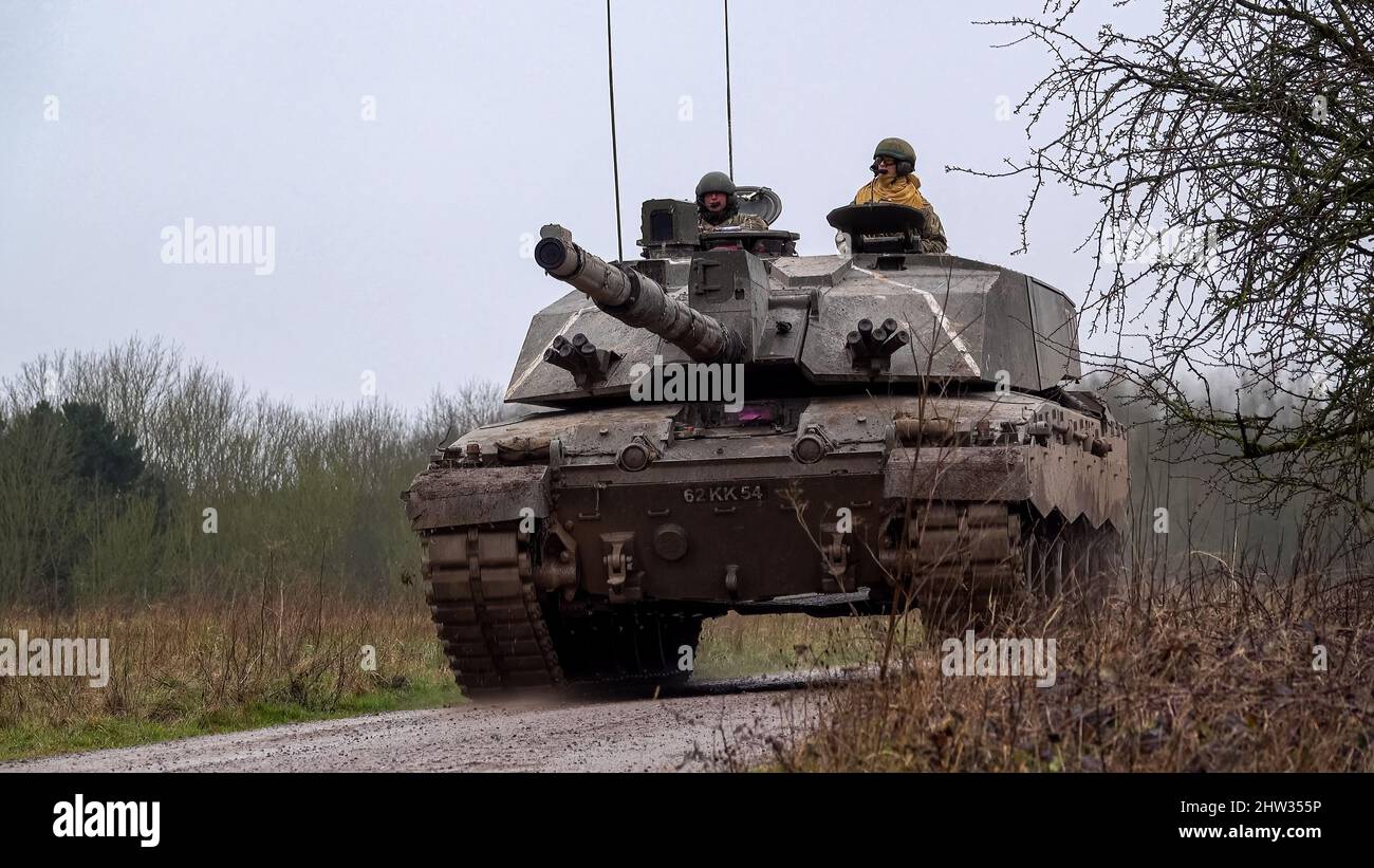 british army challenger 2 main battle tank in action on exercise on Salisbury Plain military ...