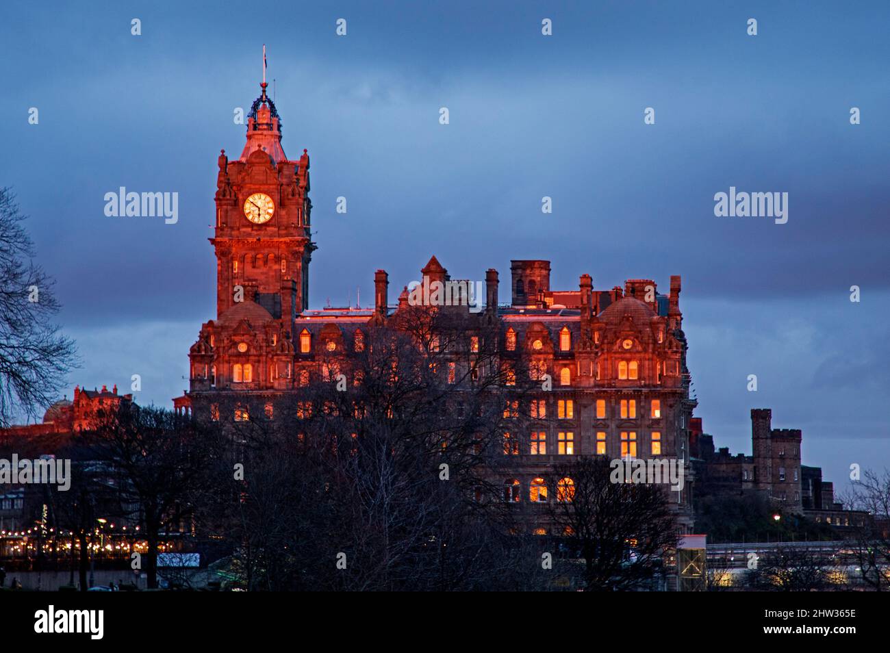 Edinburgh, city centre, Scotland, UK. 3rd March 2022. Sunset reflecting ...