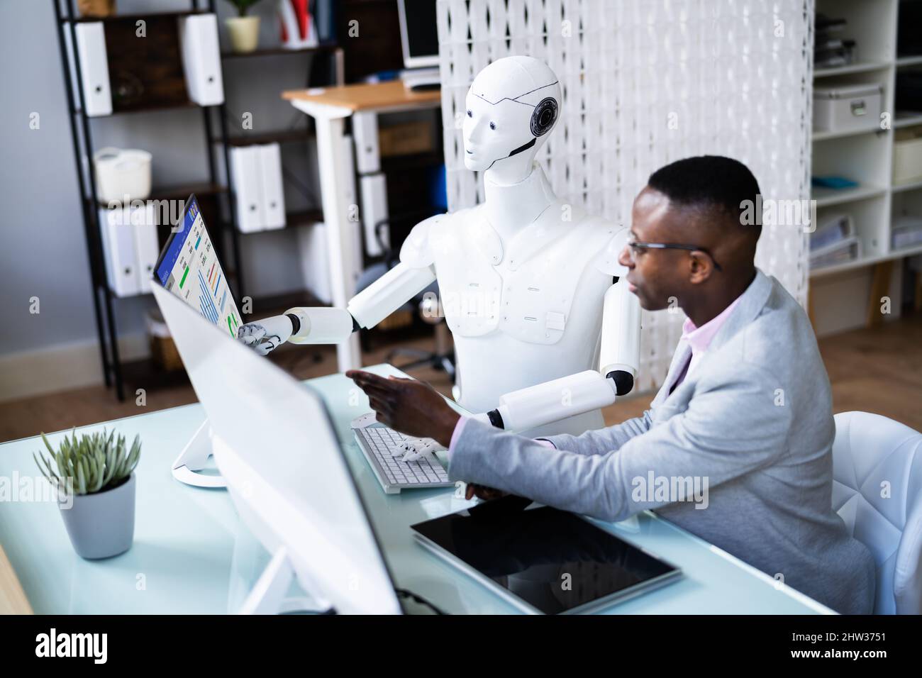 AI Humanoid Advisor Robot Looking At KPI Data Dashboard Stock Photo - Alamy