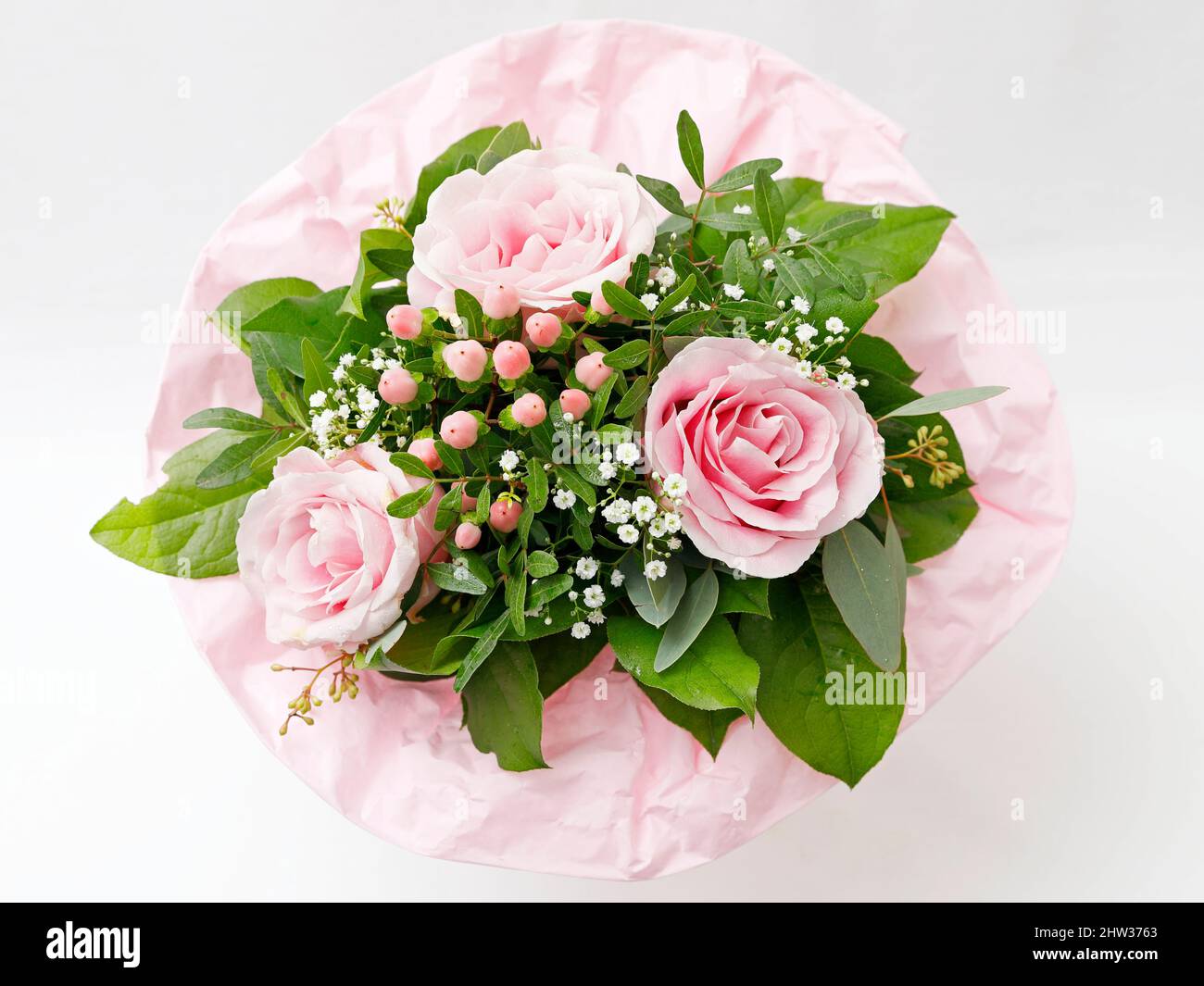 A little pretty bouquet with pink roses Stock Photo - Alamy