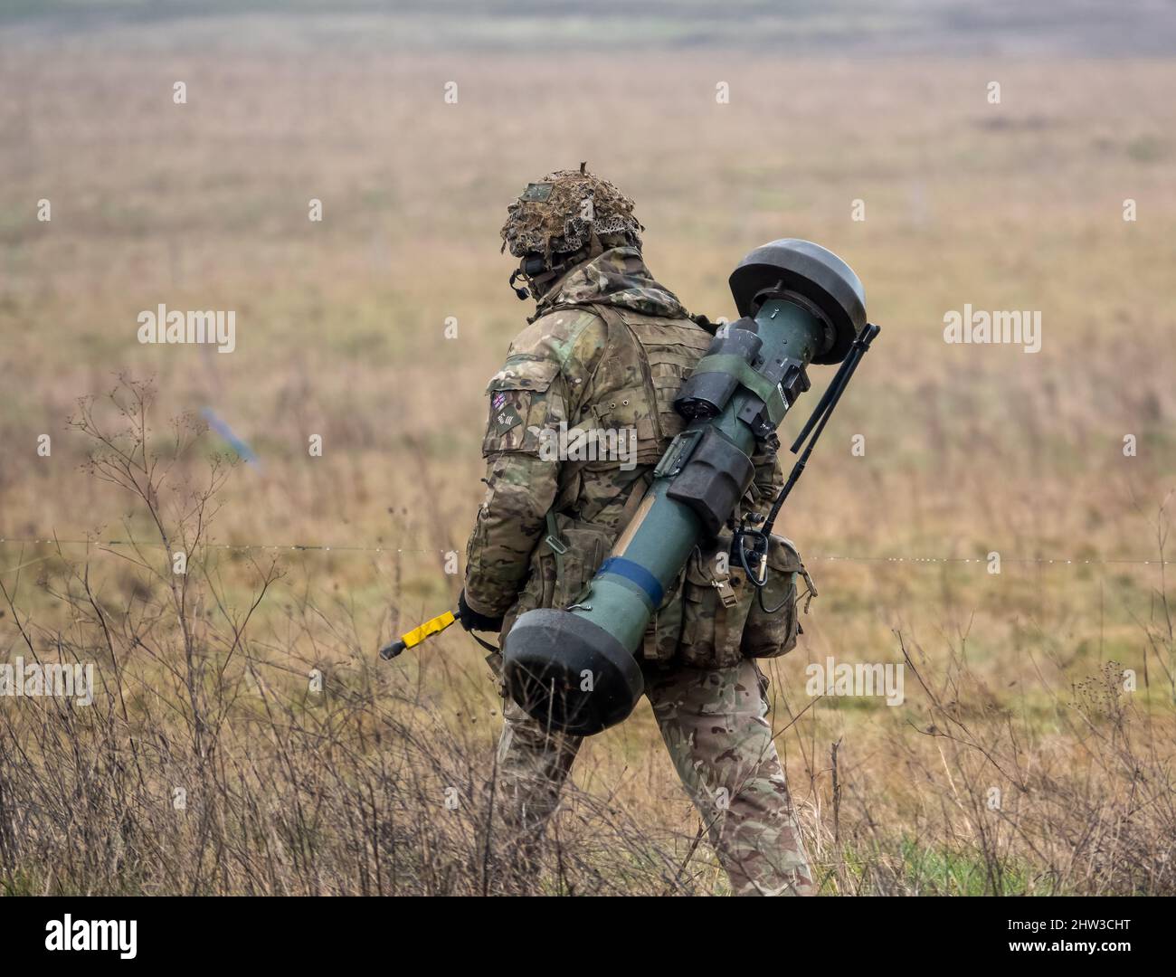 British army soldier completing an 8 mile combat fitness test tabbing ...