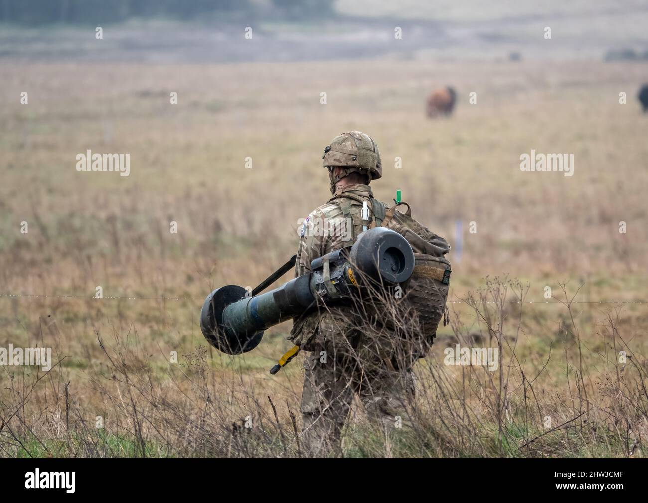 British army soldier completing an 8 mile combat fitness test tabbing ...