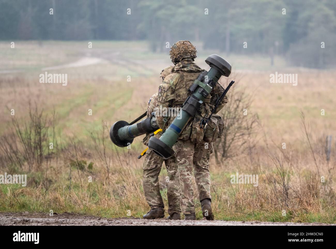 British army soldiers completing an 8 mile combat fitness test tabbing ...