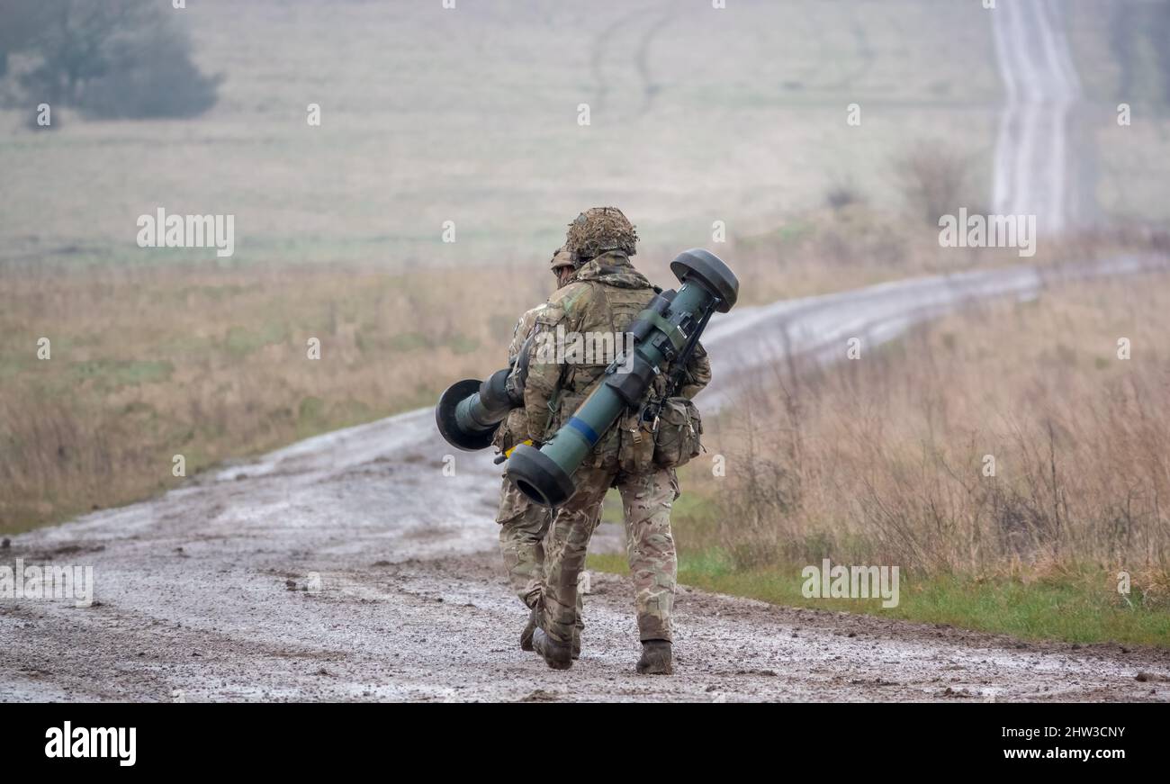 British army soldiers completing an 8 mile combat fitness test tabbing ...