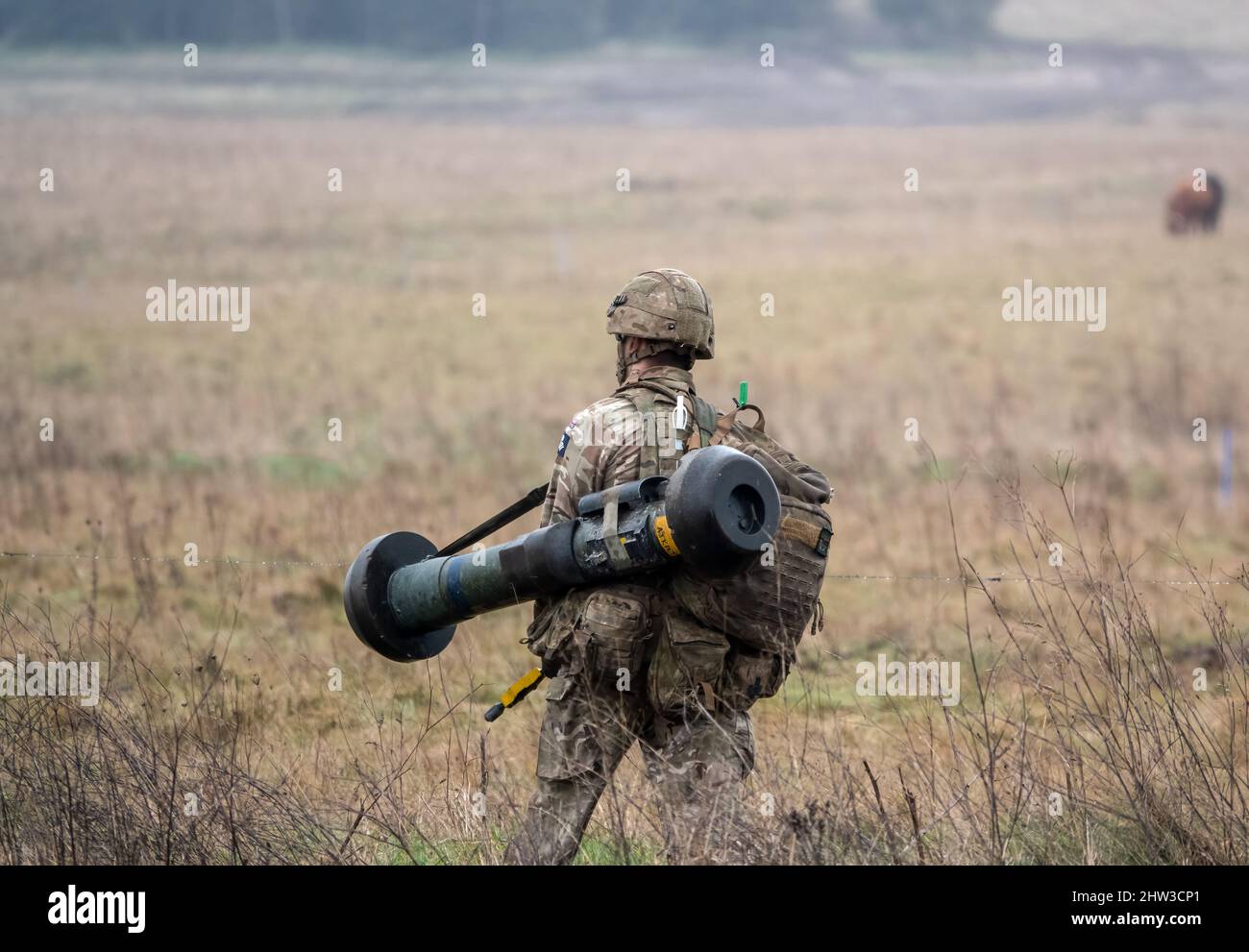 British army soldier completing an 8 mile combat fitness test tabbing ...