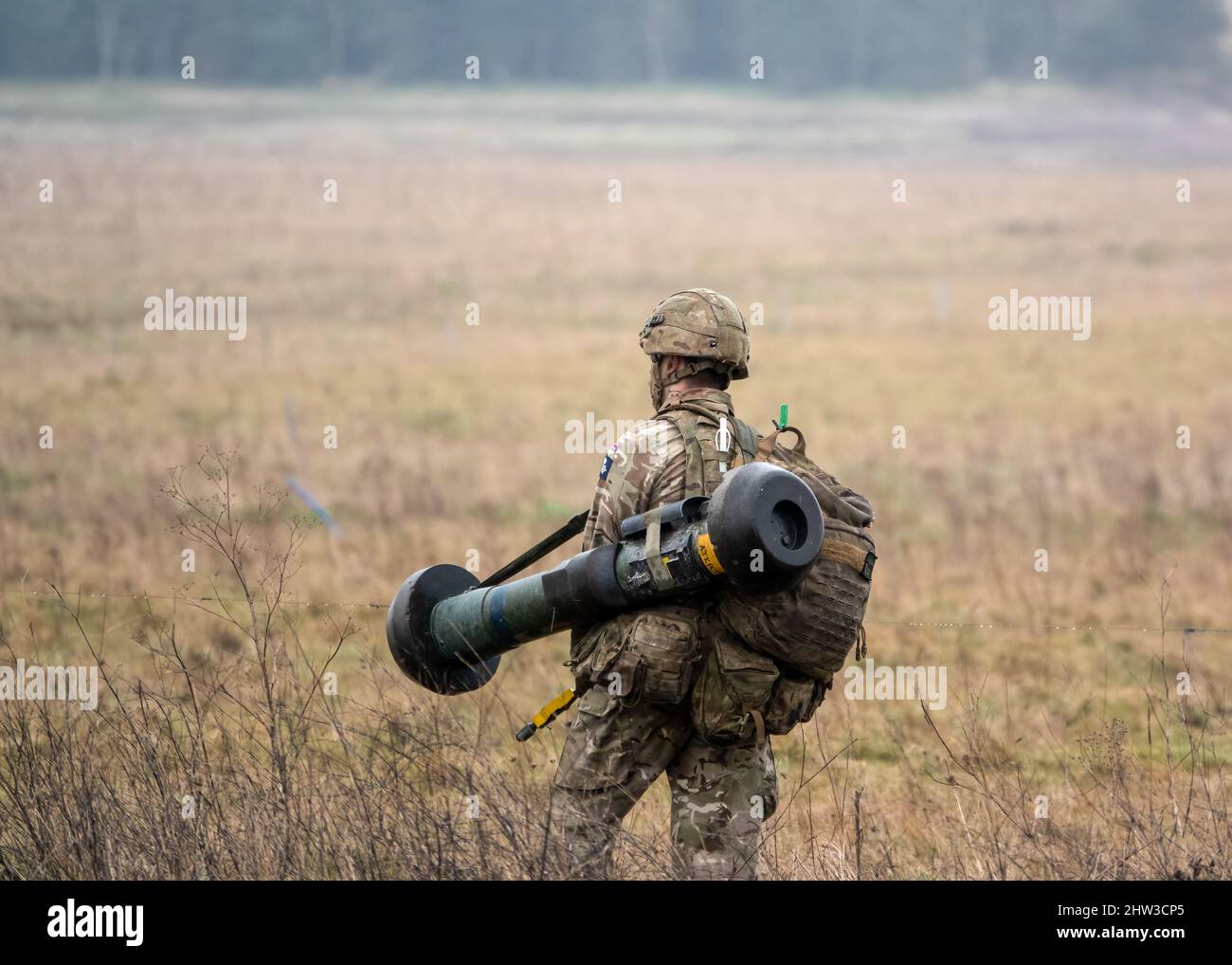 British army soldier completing an 8 mile combat fitness test tabbing ...