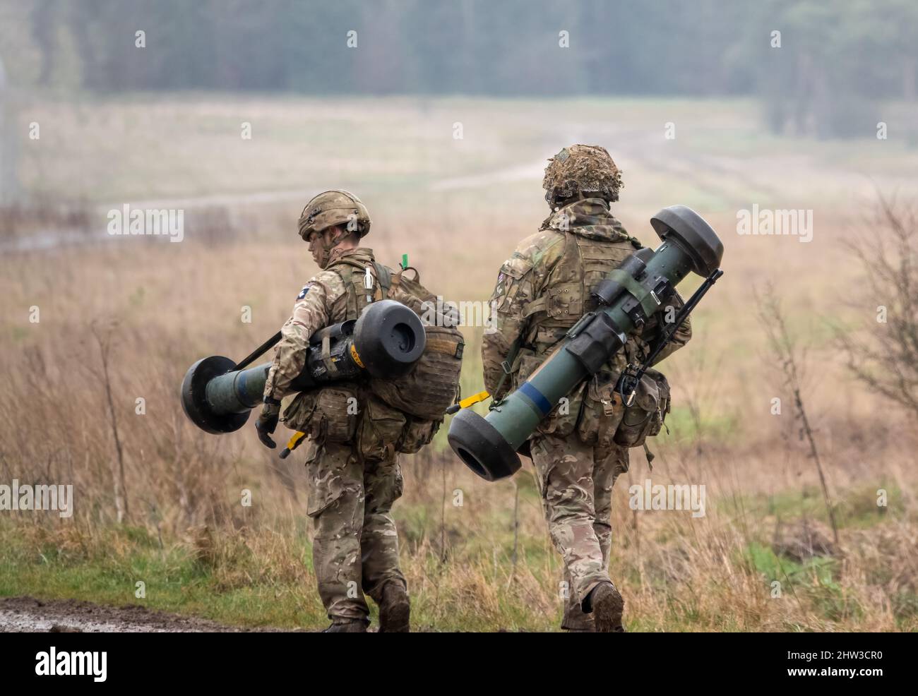 British army soldiers completing an 8 mile combat fitness test tabbing ...