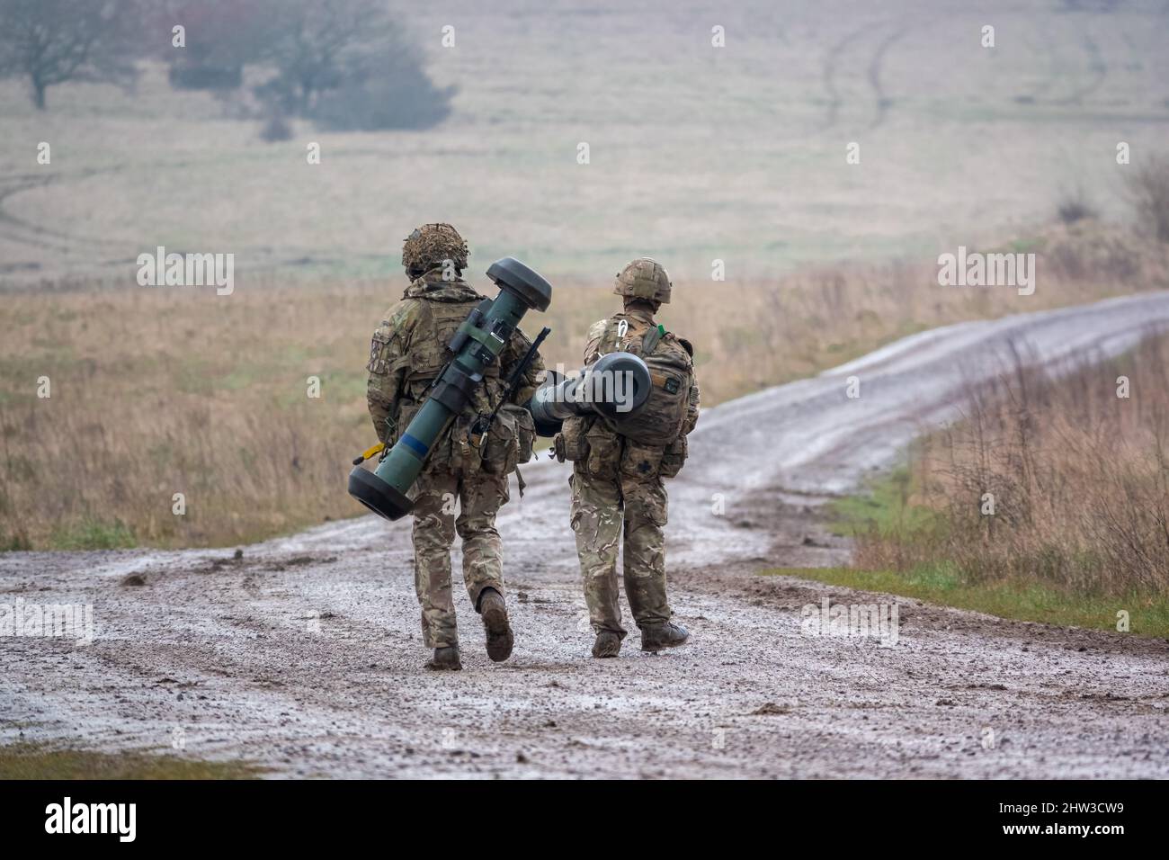 British army soldiers completing an 8 mile combat fitness test tabbing ...