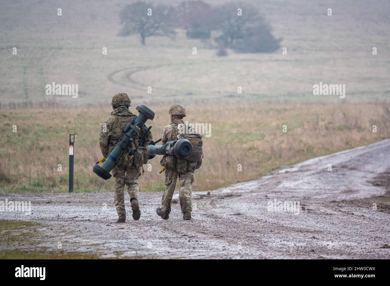 British army soldiers completing an 8 mile combat fitness test tabbing ...