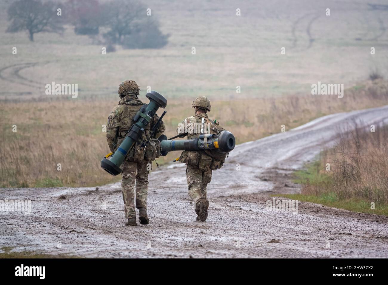 British army soldiers completing an 8 mile combat fitness test tabbing ...