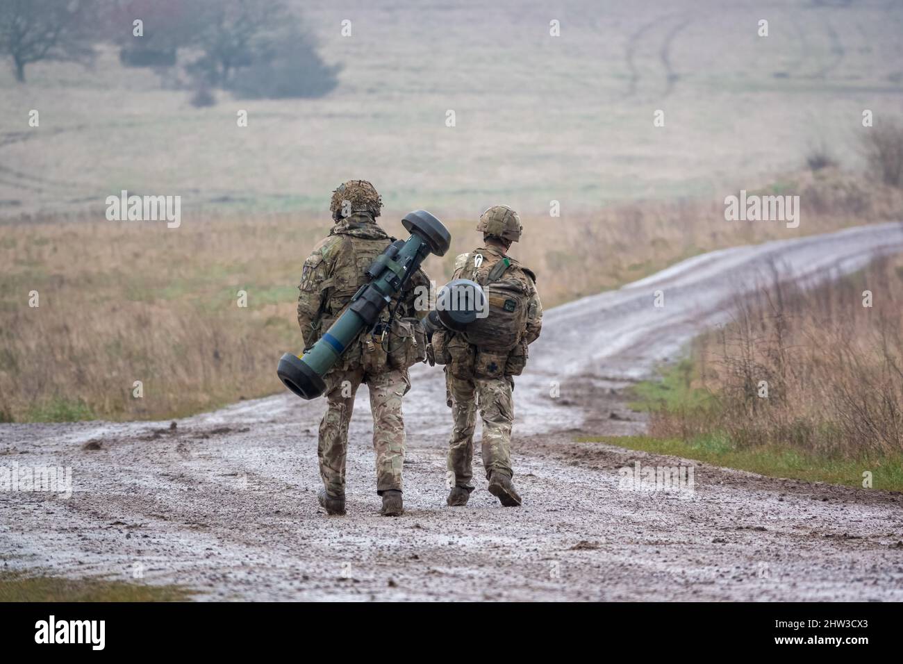 British army soldiers completing an 8 mile combat fitness test tabbing ...