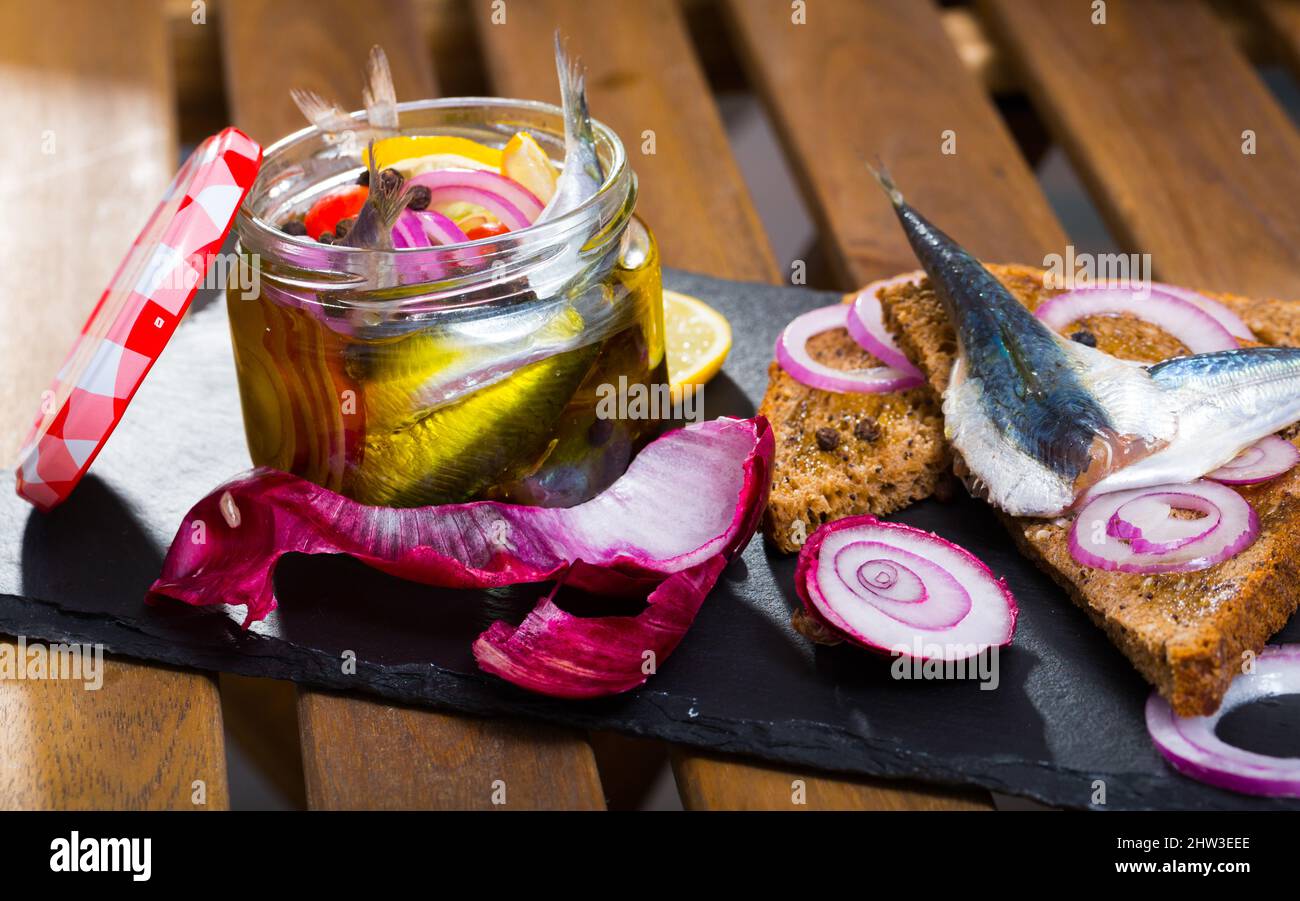 Fish dish - homemade pickling pilchards Stock Photo - Alamy