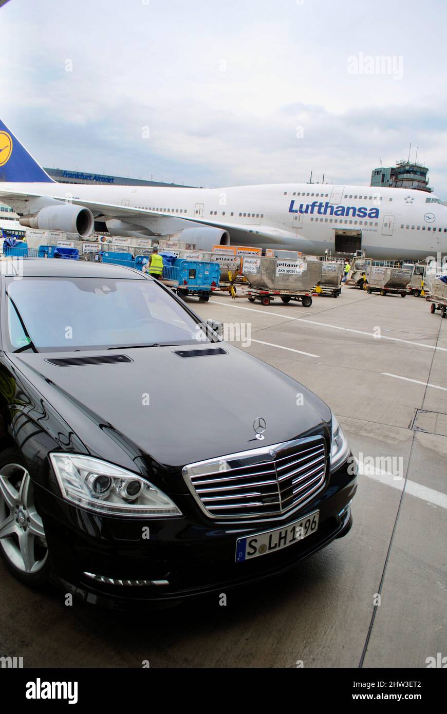 Black limousine transporting Lufthansa First class passengers to their ...