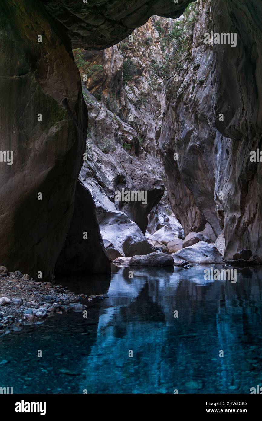 natural tunnel in a canyon with a clean transparent water Stock Photo ...