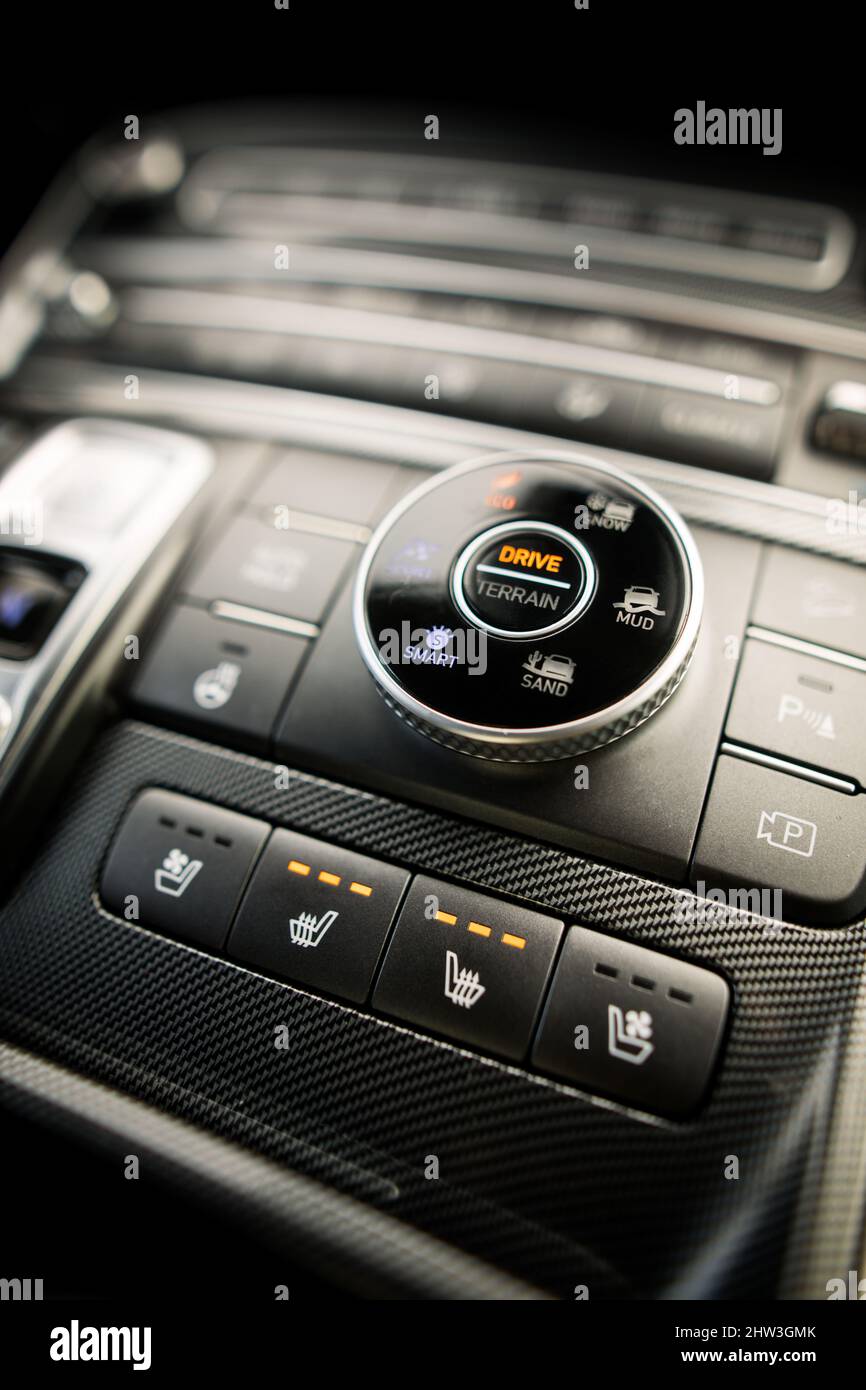 Close up shot of a modern car drive mode selector button, on the ...