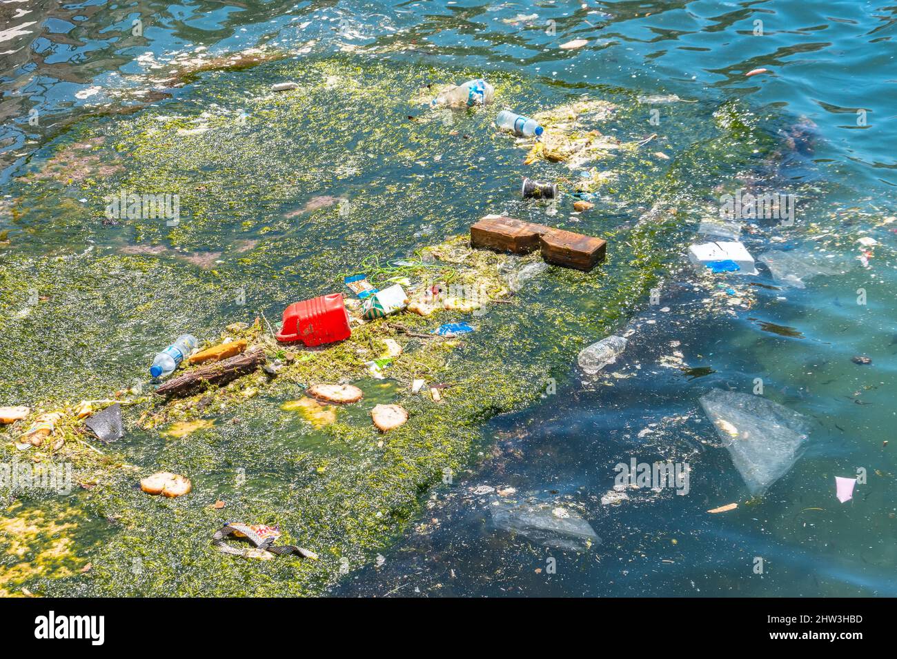 The island of garbage floats in the sea Stock Photo - Alamy