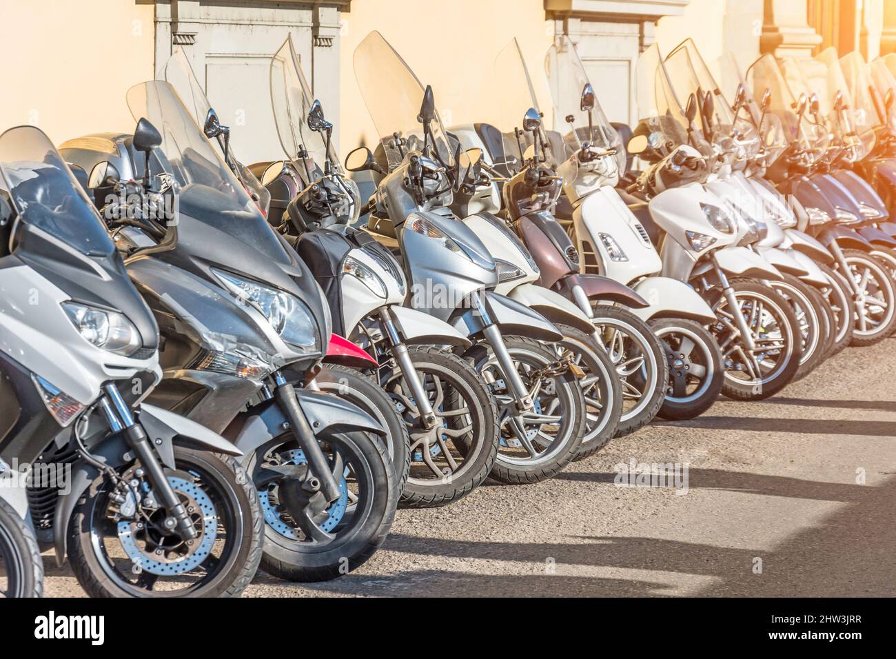 Row of scooters hi-res stock photography and images - Alamy