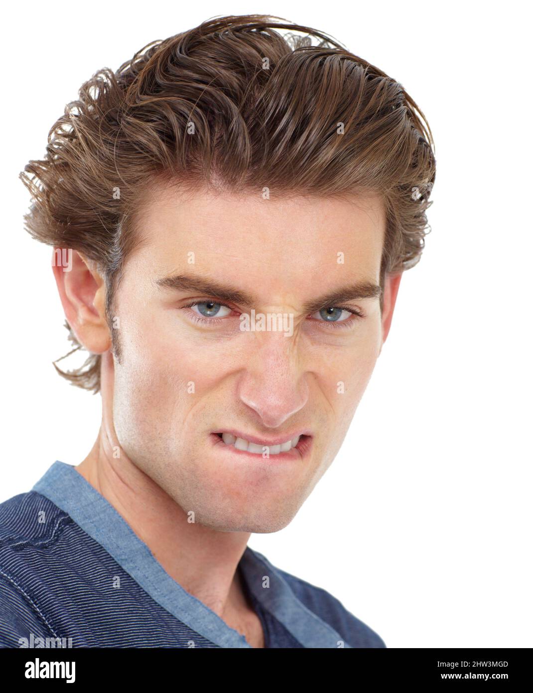 Youre making him angry. Portrait of a young man giving you a feisty ...