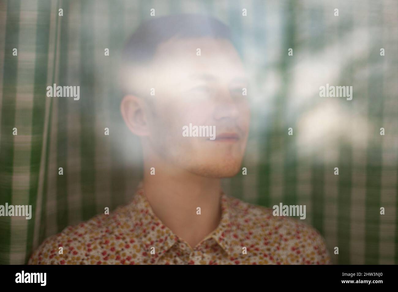 Face behind glass. The man outside the window. Spoils through ...