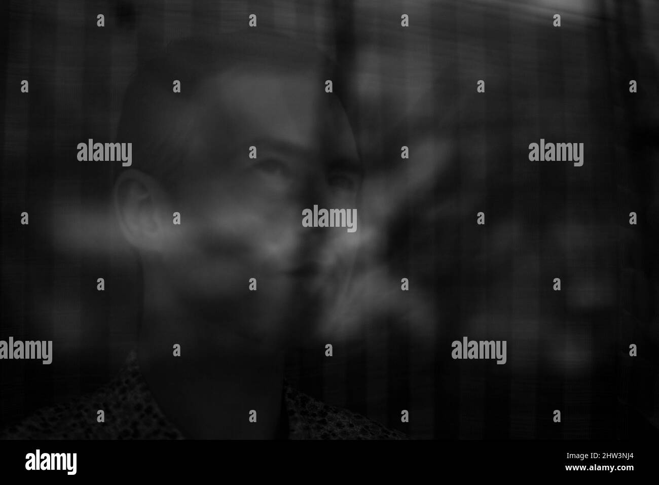 Face behind glass. The man outside the window. Spoils through ...