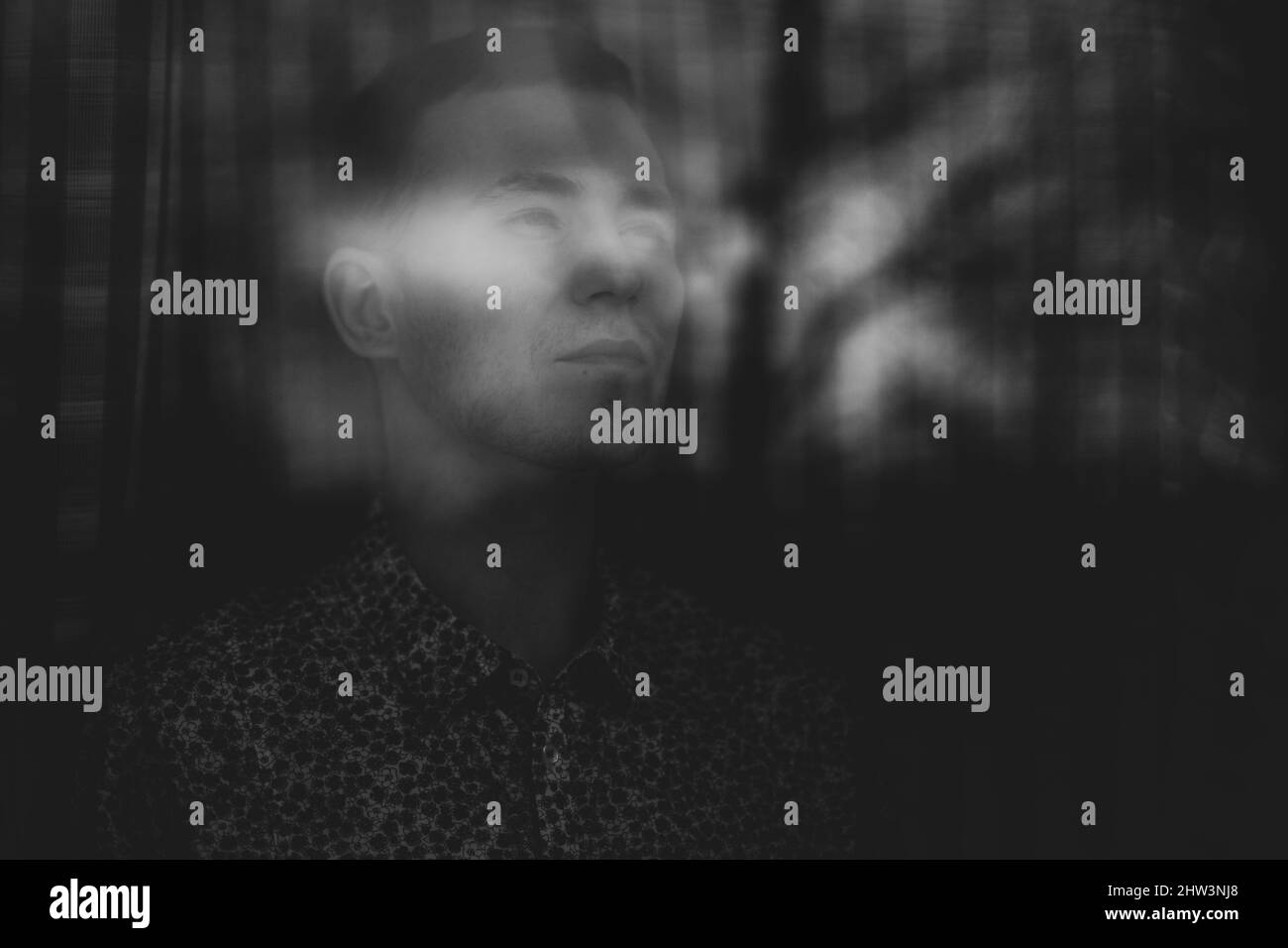 Face behind glass. The man outside the window. Spoils through ...