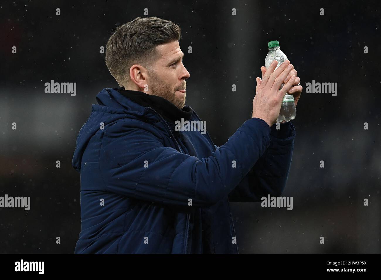 Luke Garrard manager of Boreham Wood applauds the fans at half time ...