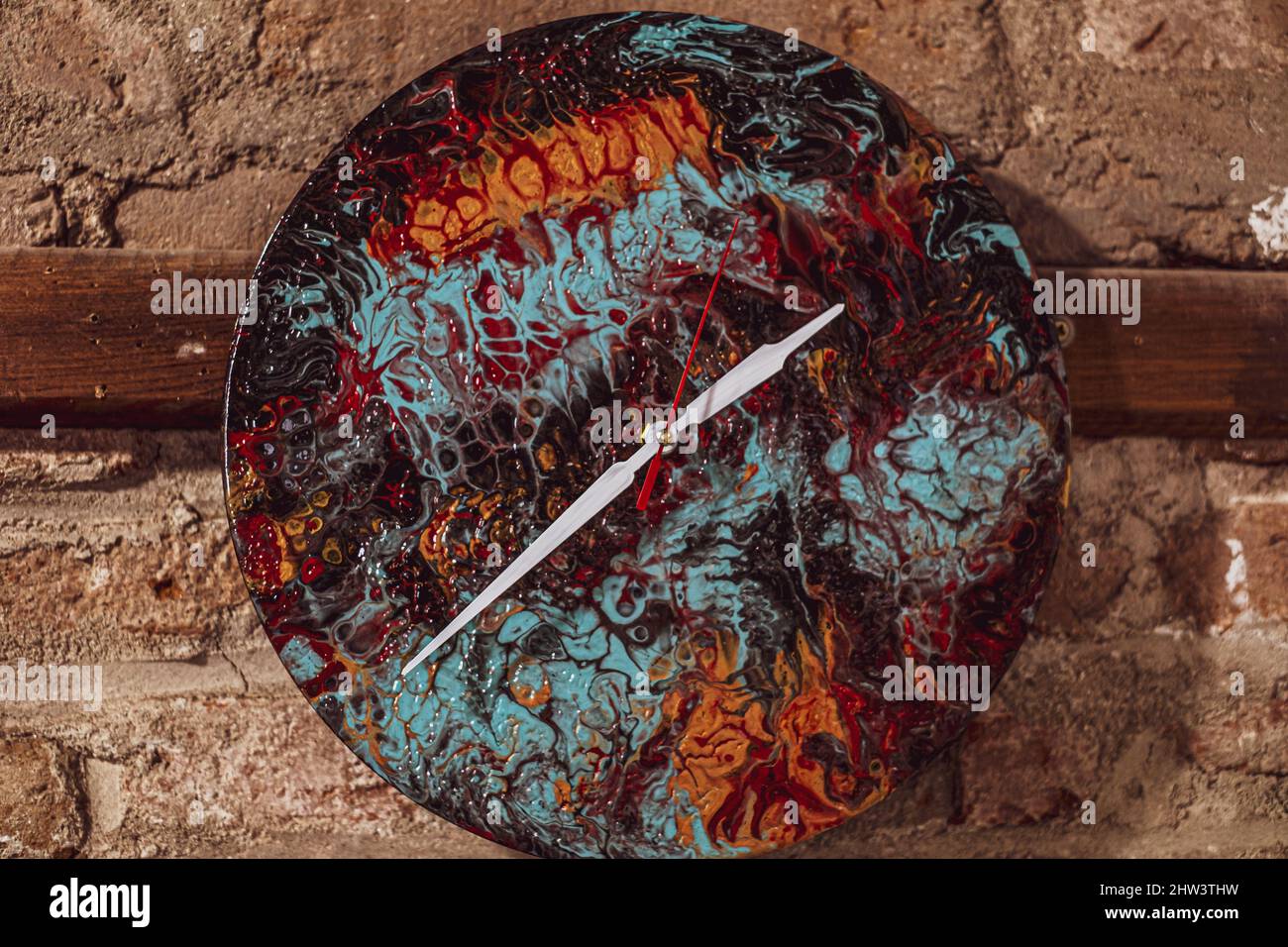 painted wall clock caught on a wooden plank Stock Photo - Alamy