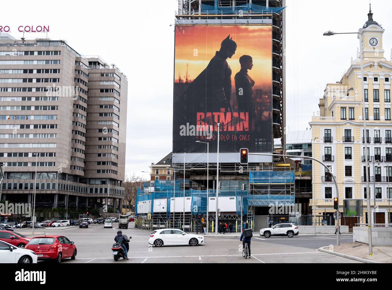 Pedestrians walk past a street commercial advertisement billboard from ...