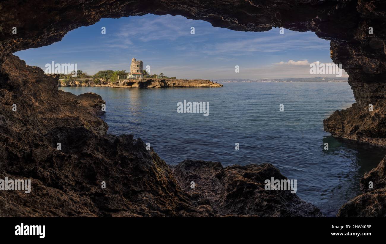 Beautiful scene through a rocky cave of the castle of Cabarroca in ...