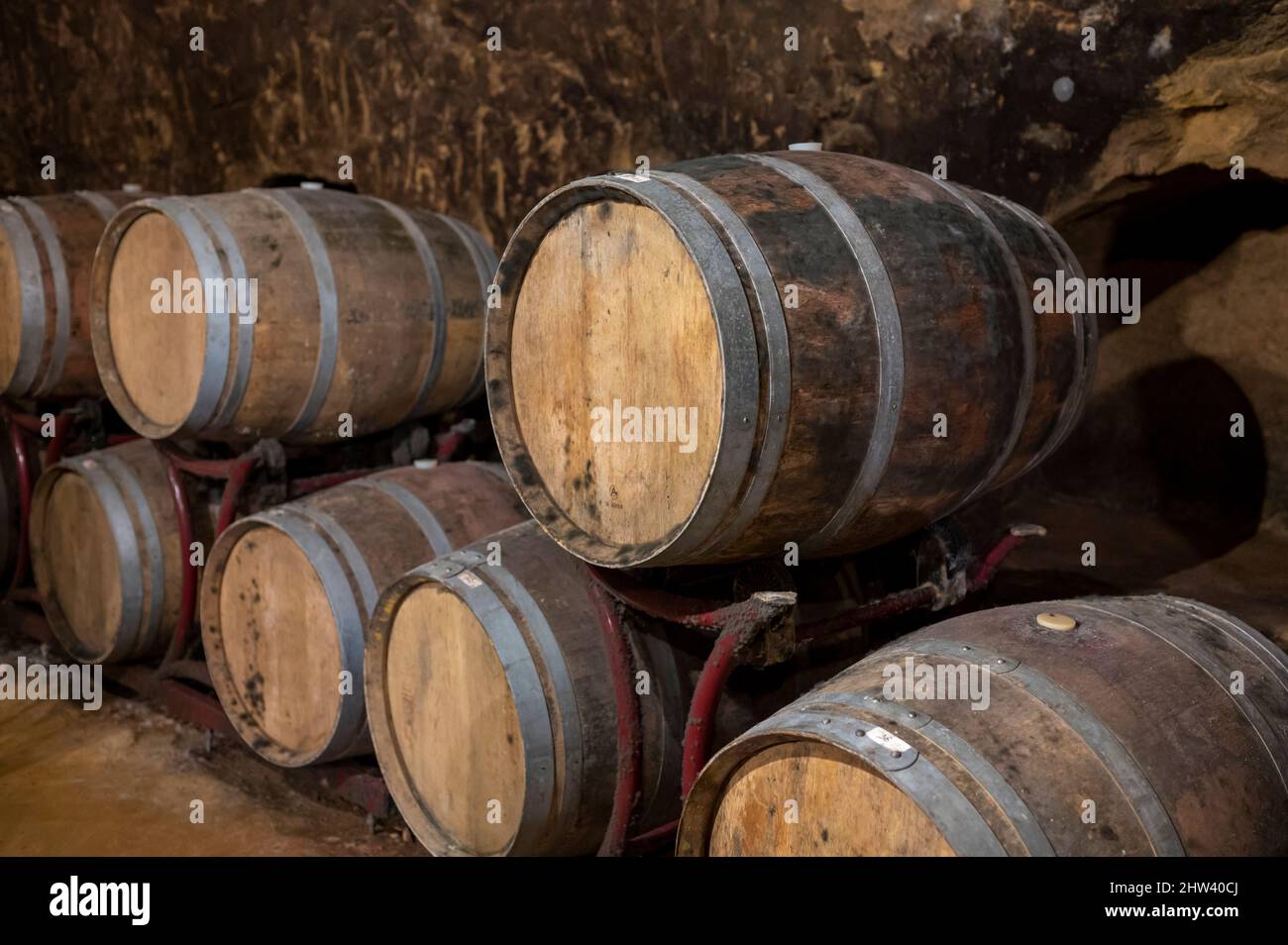 Medieval underground wine cellars with old red wine barrels for aging ...