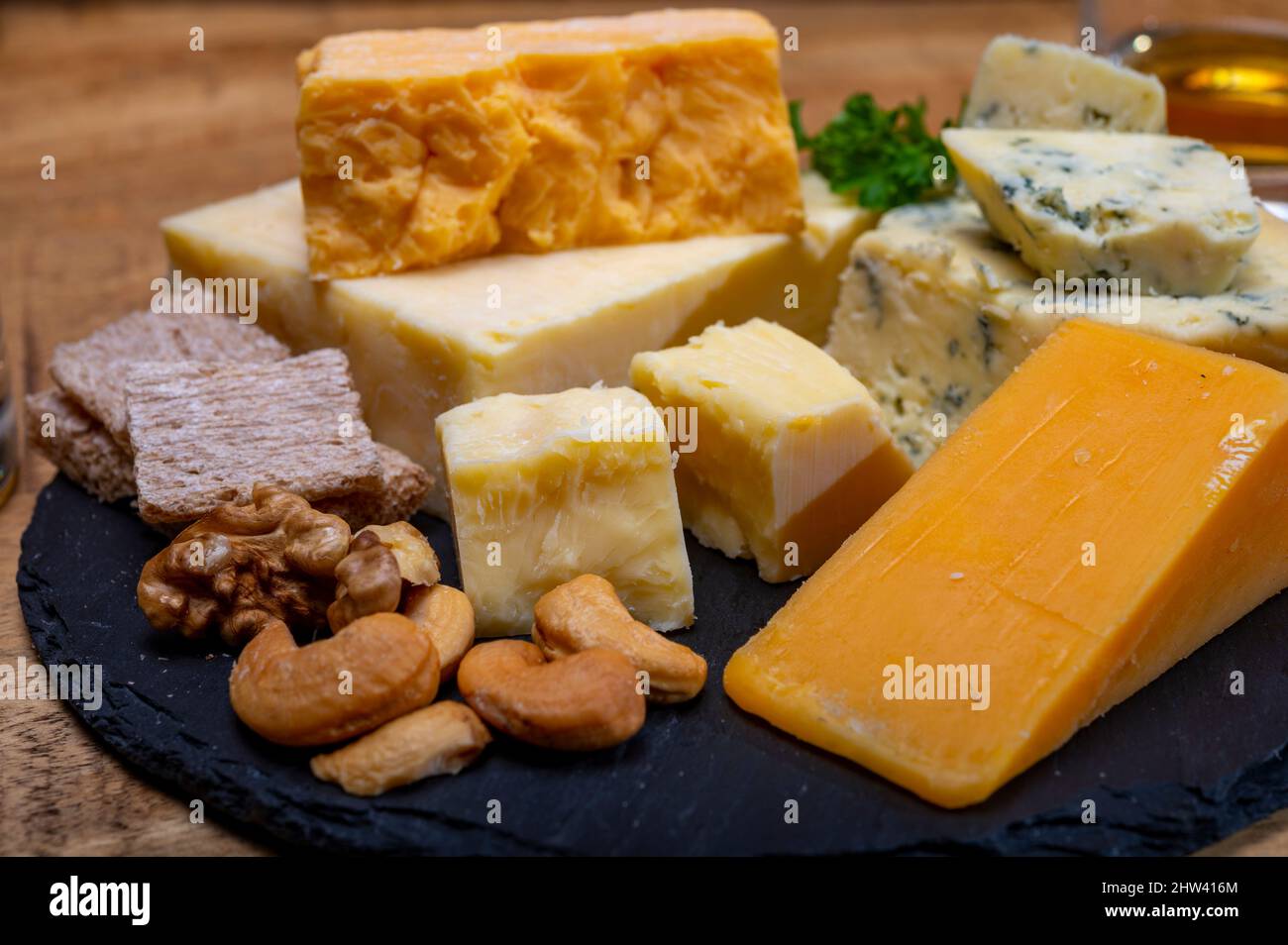 British drinks and food pairing, glasses of Scotch whisky and cheeses ...