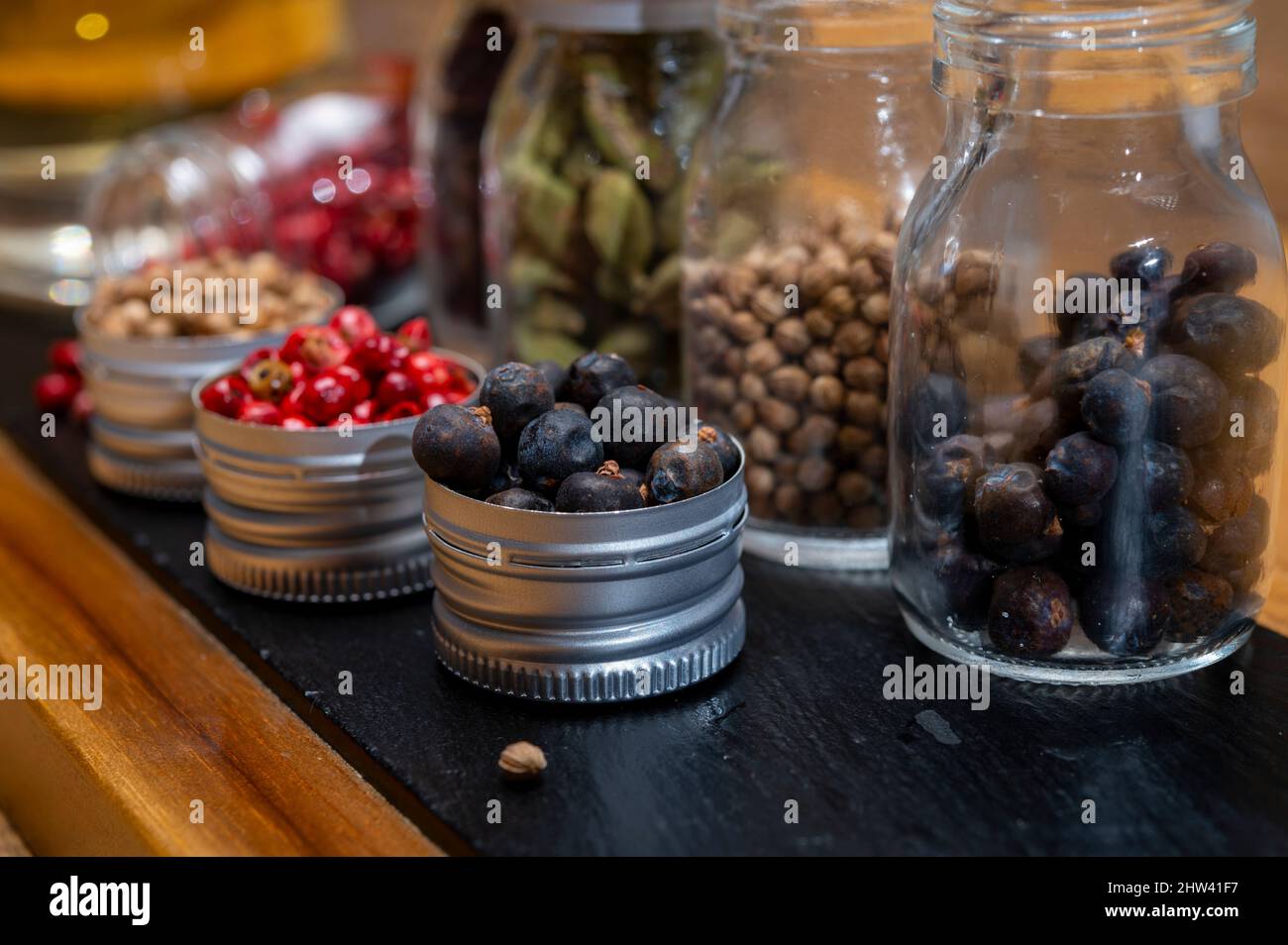 Professional set of gin spices in small bottles, pink pepper, hibiscus ...