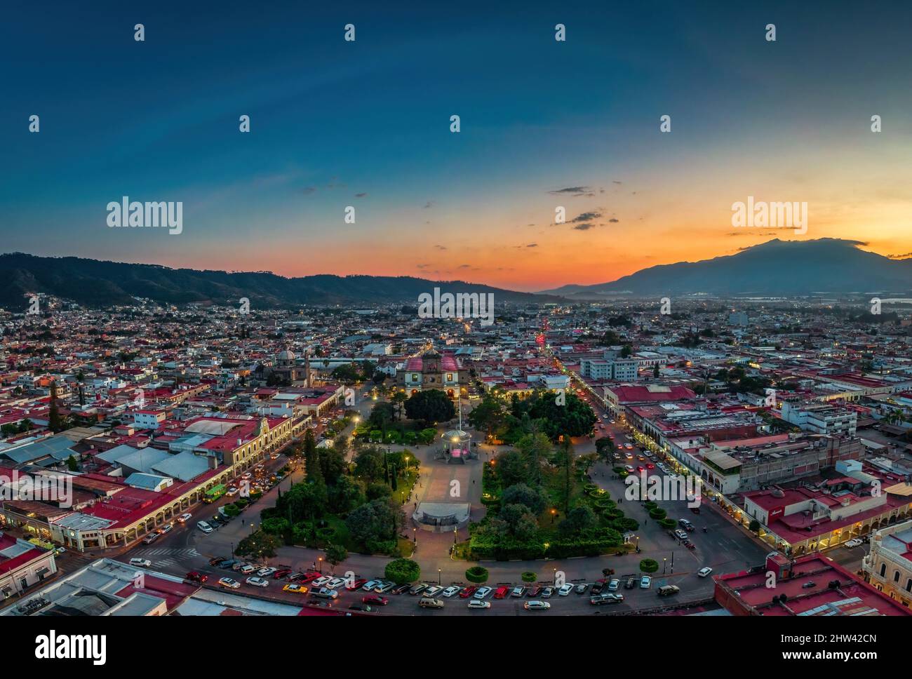 Aerial fisheye view of a park in the Ciudad Guzman at night in Jalisco ...