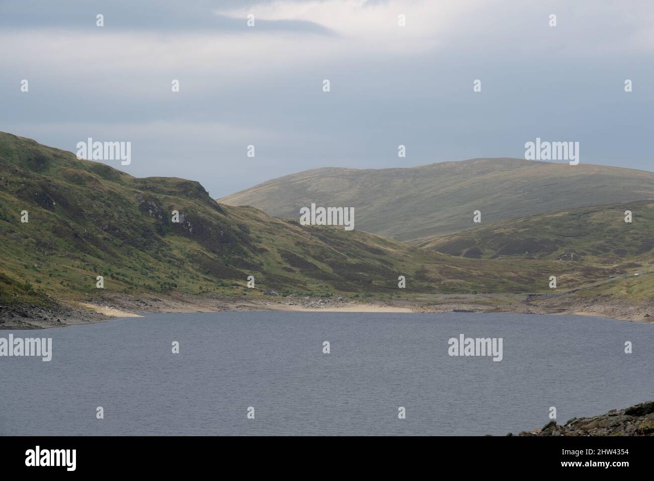 A view over Lochan na Lairige with the mountain ridges above, in the ...