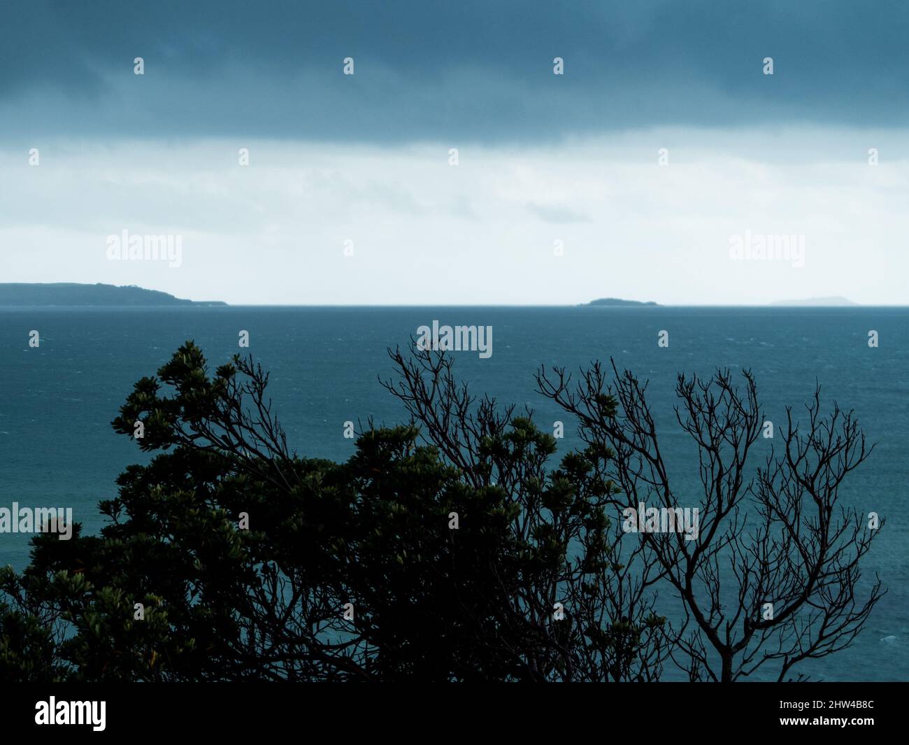 Stormy Summer weather, looking towards horizon, layers of moody grey ...