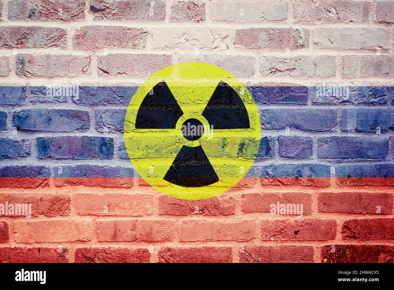 Russian flag on wall and radioactive symbol Stock Photo - Alamy