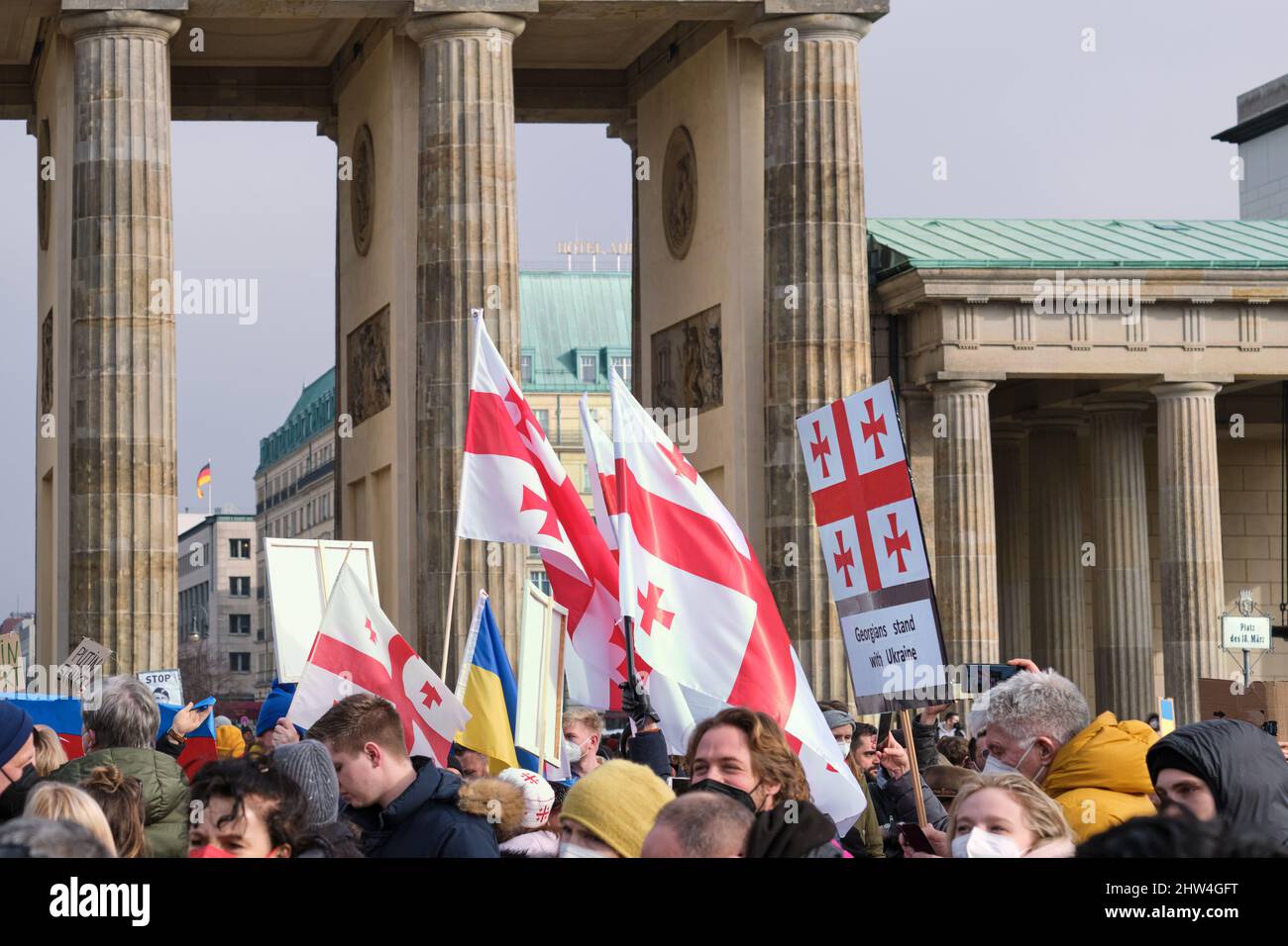 Georgian national flags on anti war protest in German capital ...