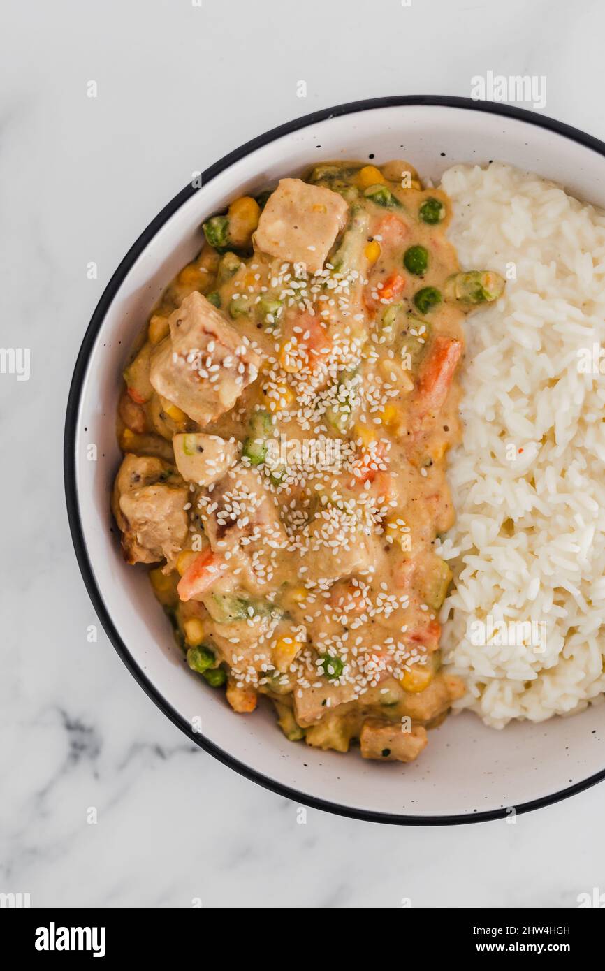 vegan satay veggie stir fry with coconut milk rice, healthy plant-based ...