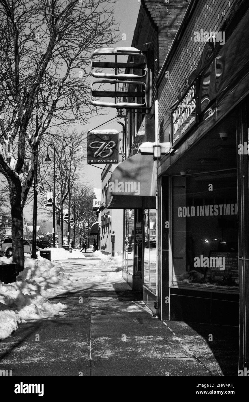 A view down Main Street of abandoned stores after a snow storm Stock ...