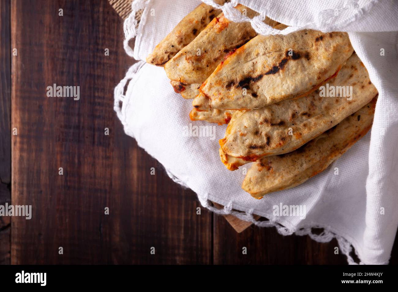 Tlacoyos. Mexican pre hispanic dish made of corn flour patty filled ...